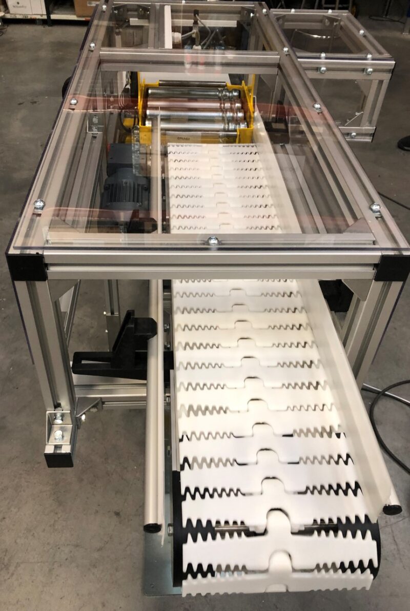 Optical Lens Handling Conveyor Systems - LVP Conveyors